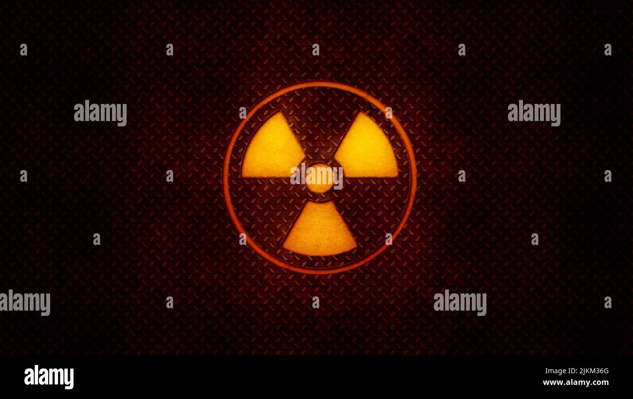 An illuminated radioactive symbol on a dark background Stock Photo - Alamy