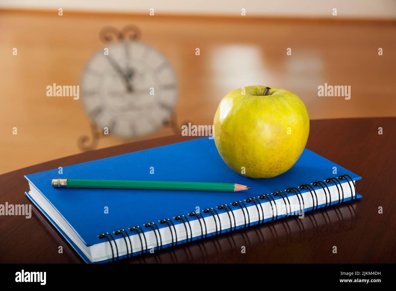 School books apple clock hi-res stock photography and images - Alamy
