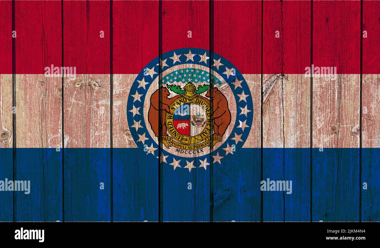 Top view of Old Painted Flag of Missouri state, USA on Dark Wooden ...