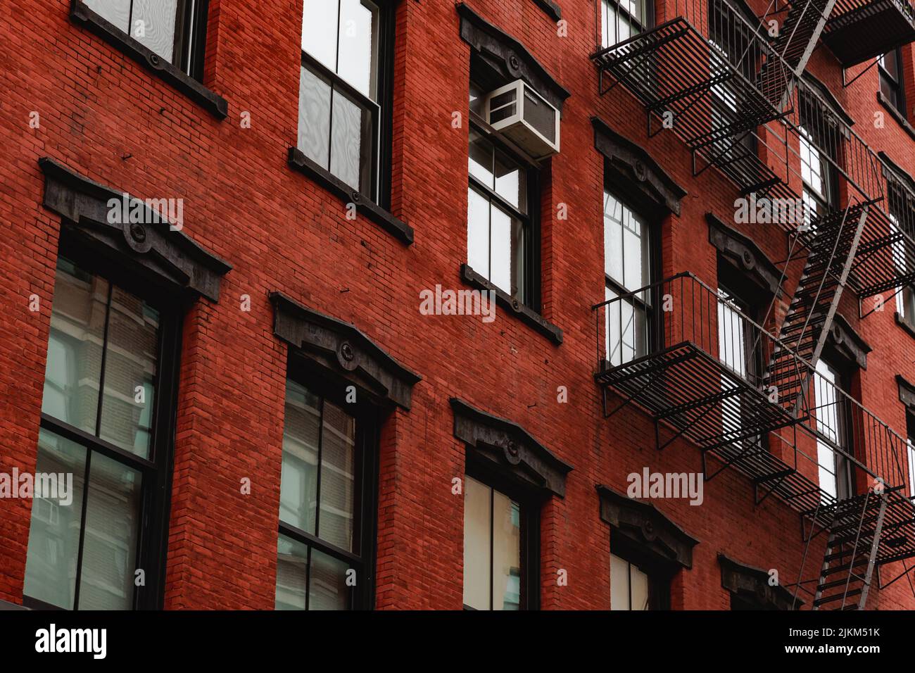 A wall of old building built from red brick in New York city Stock ...