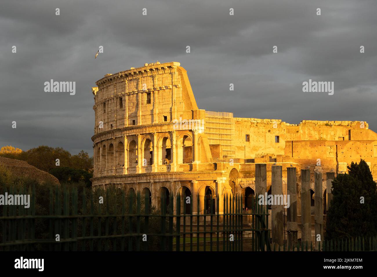 The Roman Coliseum illuminated by the sunset sun Stock Photo - Alamy