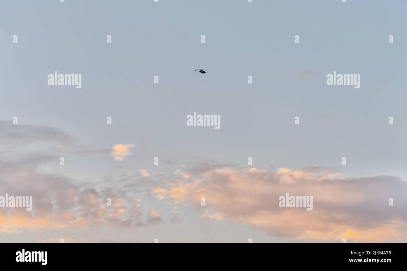 Chopper flying hi-res stock photography and images - Alamy