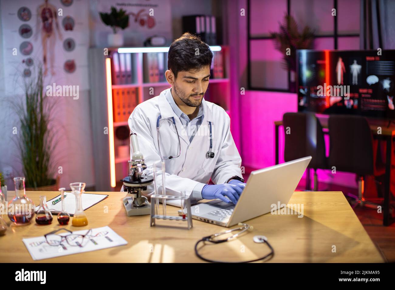 Medical research laboratory: portrait of a attractive male scientist ...