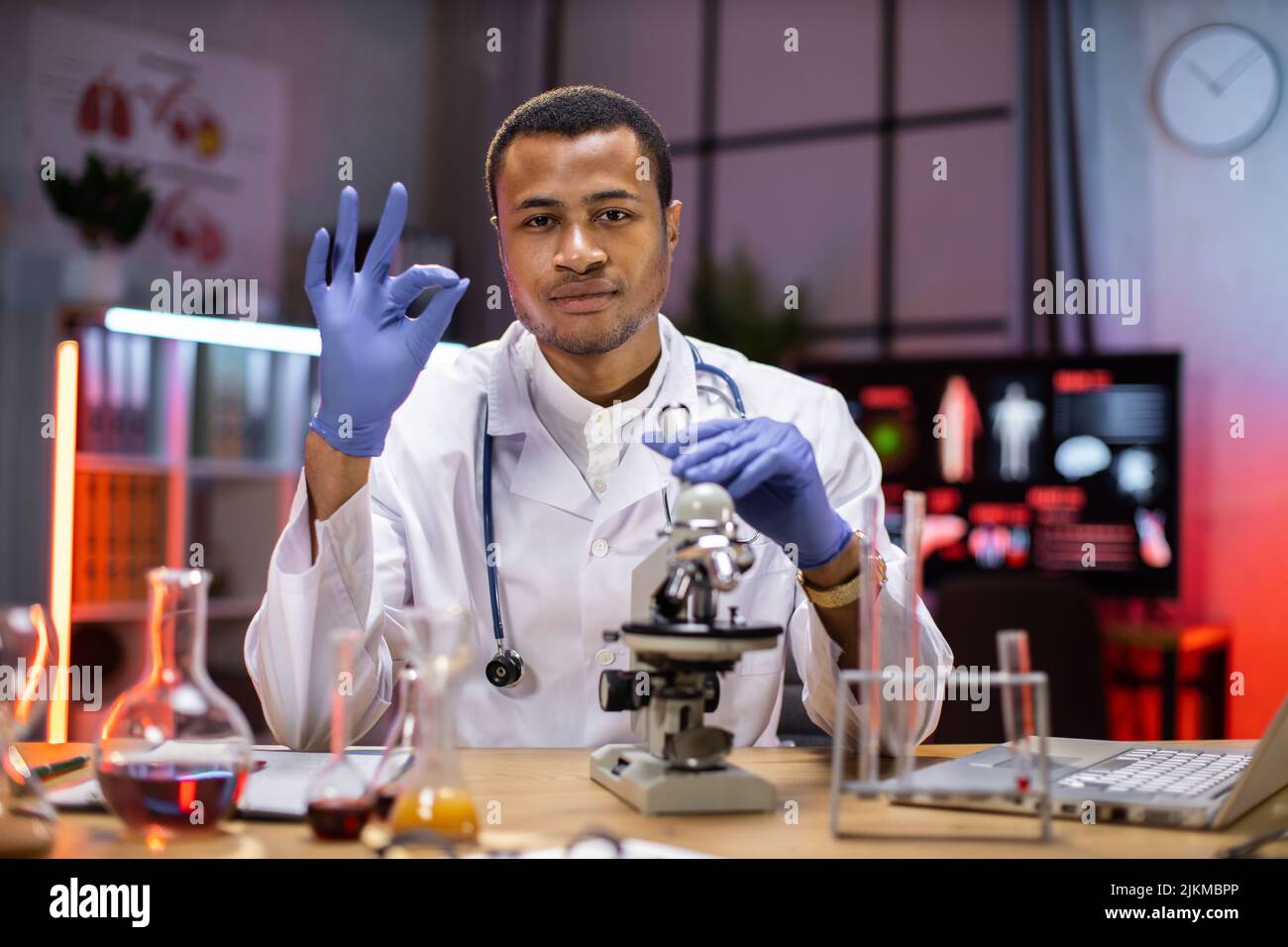 Modern medical research laboratory: portrait of scientist working ...