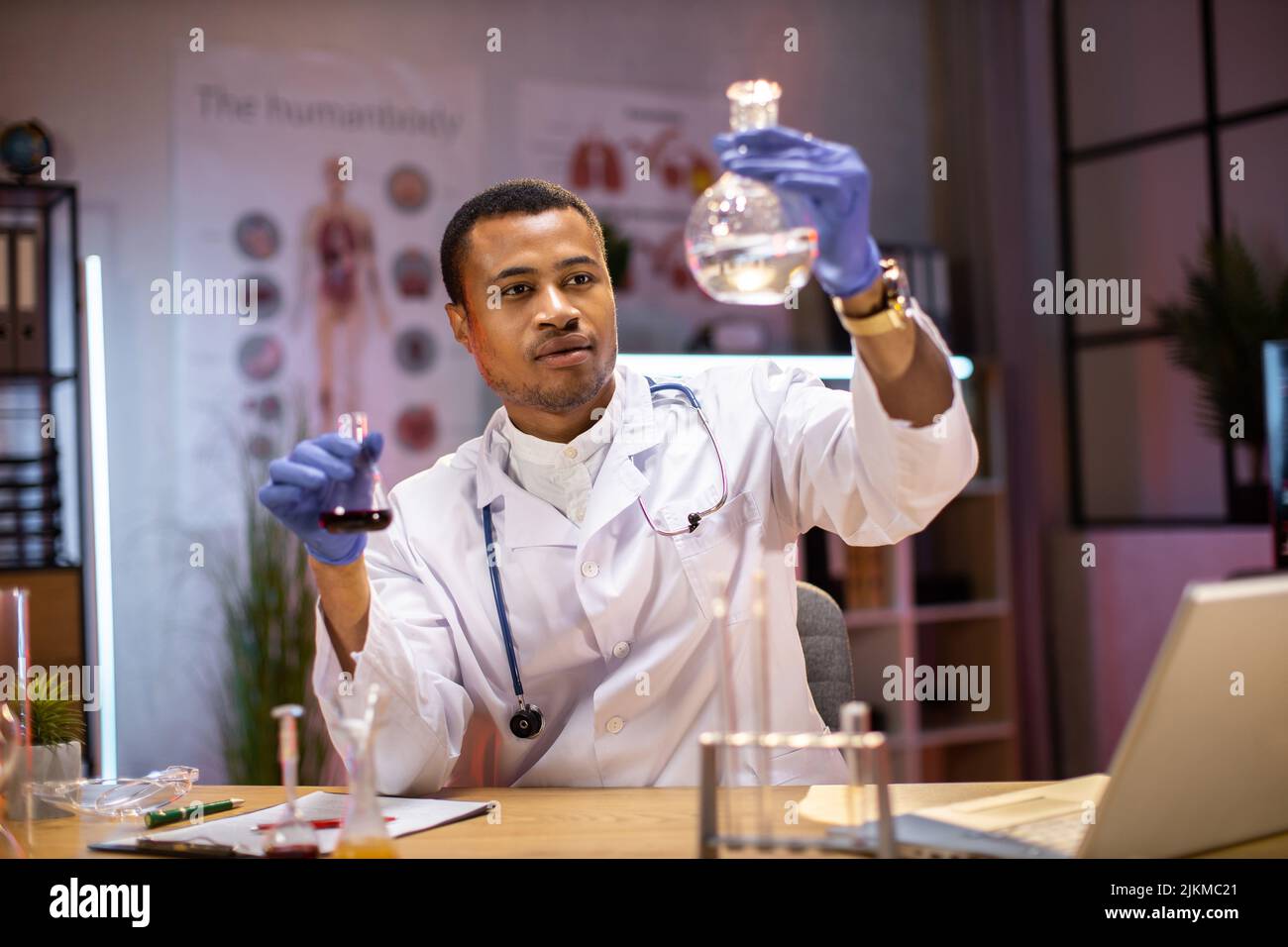 Modern medical research laboratory: african american male scientist ...
