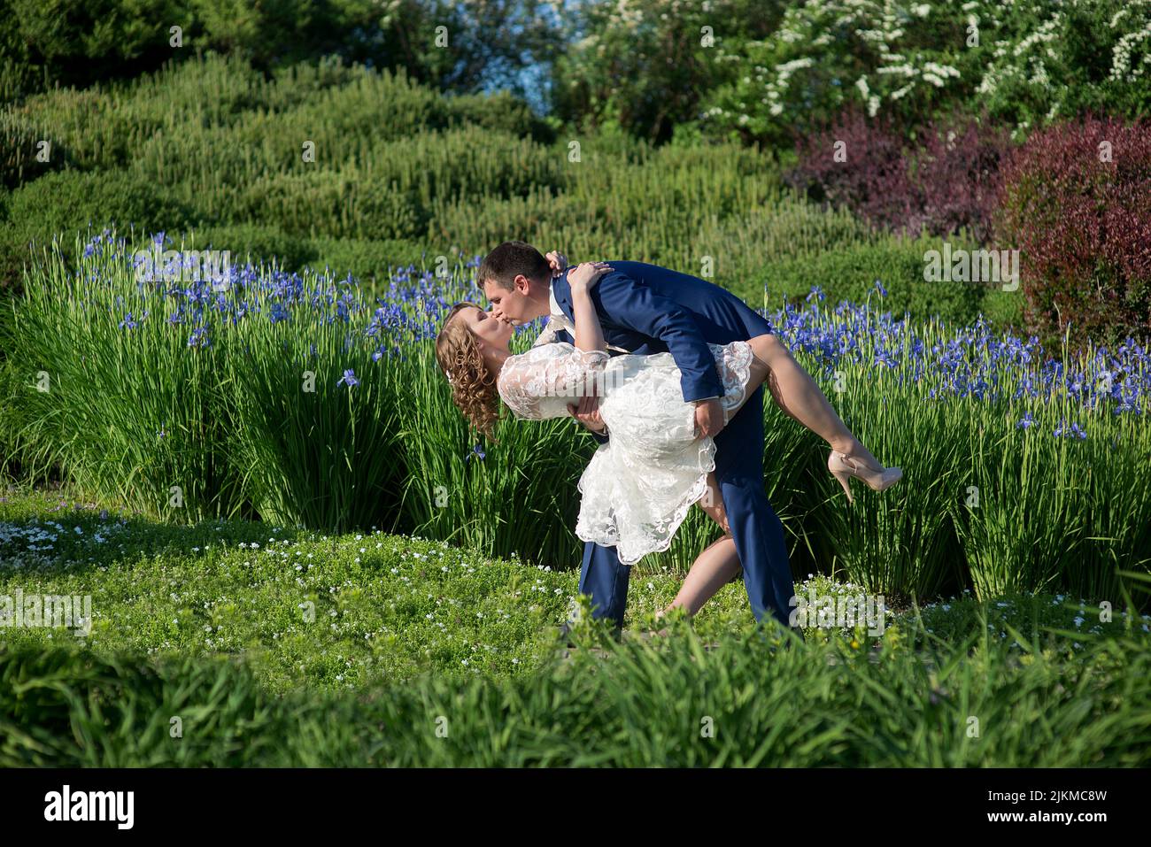 Beautiful woman kissing man hi-res stock photography and images - Alamy