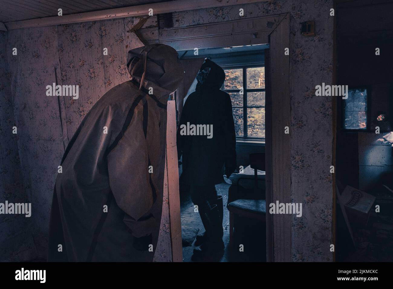 Fictional movie poster. People with flashlights, masks and protective ...