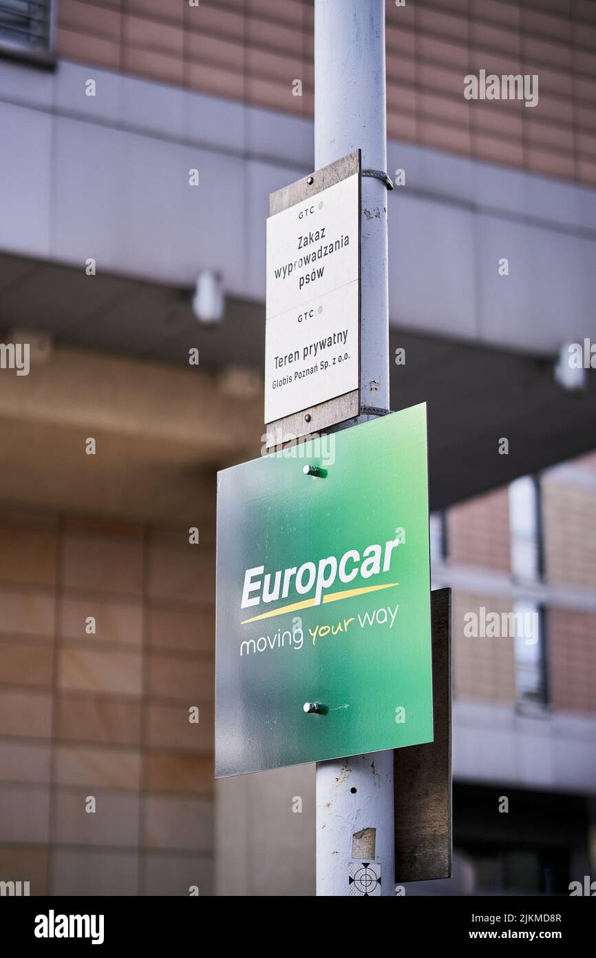 A green Europcar company rental car board of a parking lot Stock Photo ...