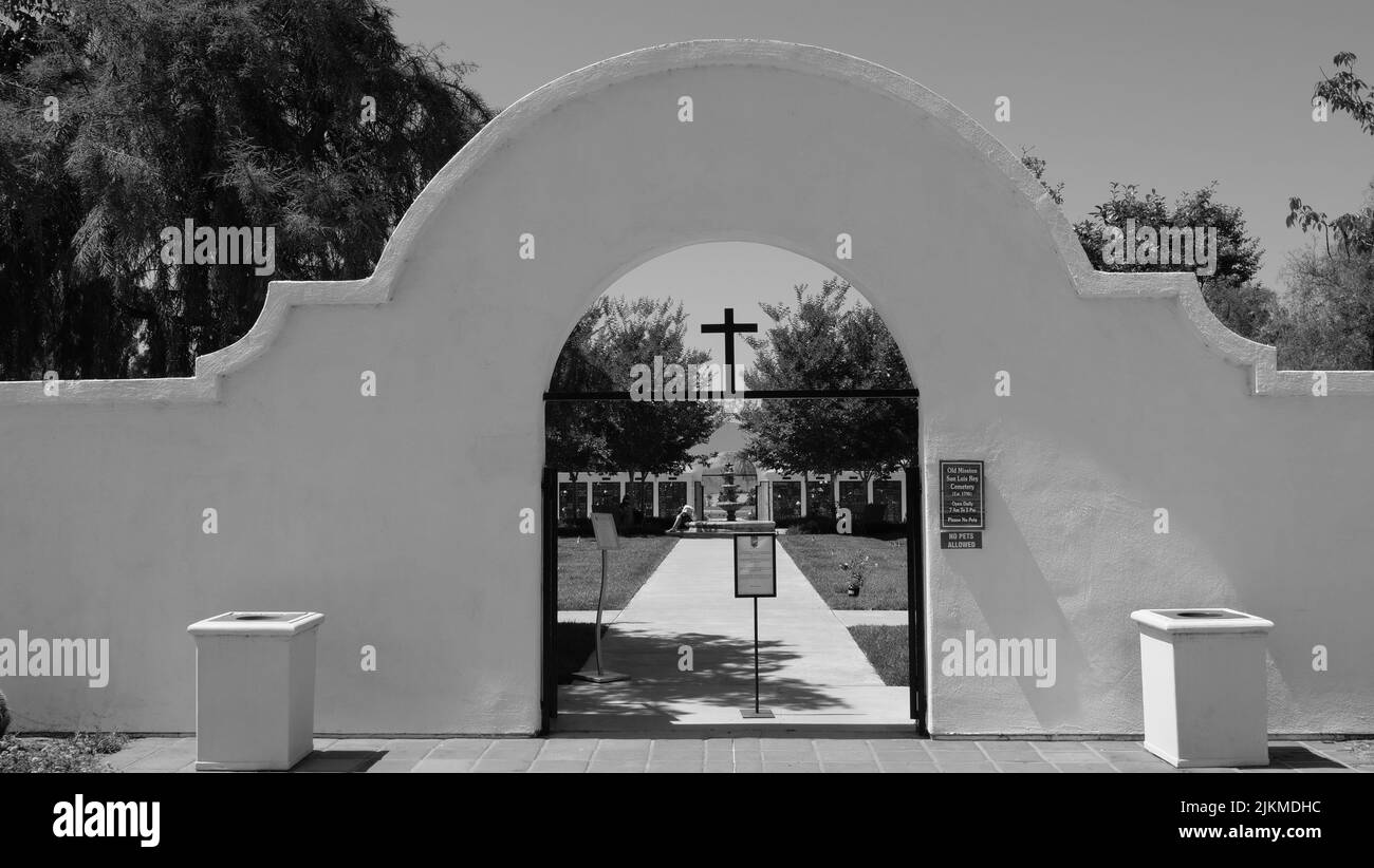 A grayscale shot of the entrance to the cemetery Mission San Luis Rey ...
