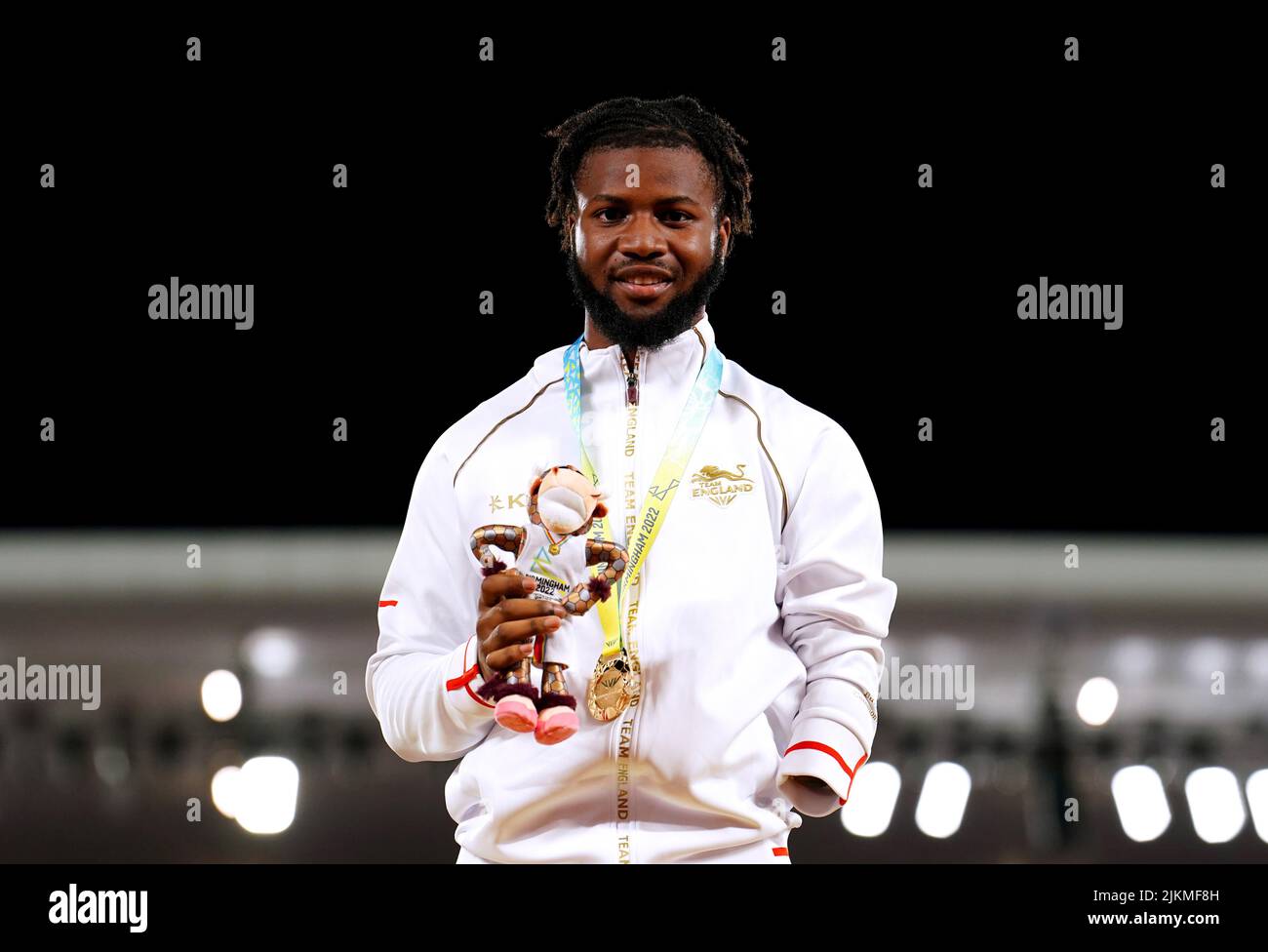 England's Emmanuel Temitayo Oyinbo-Coker celebrates with his gold medal ...