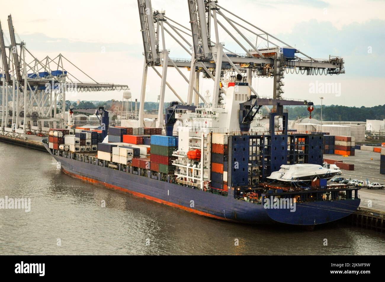 Container ship in port at container terminal. Ships of container ships ...