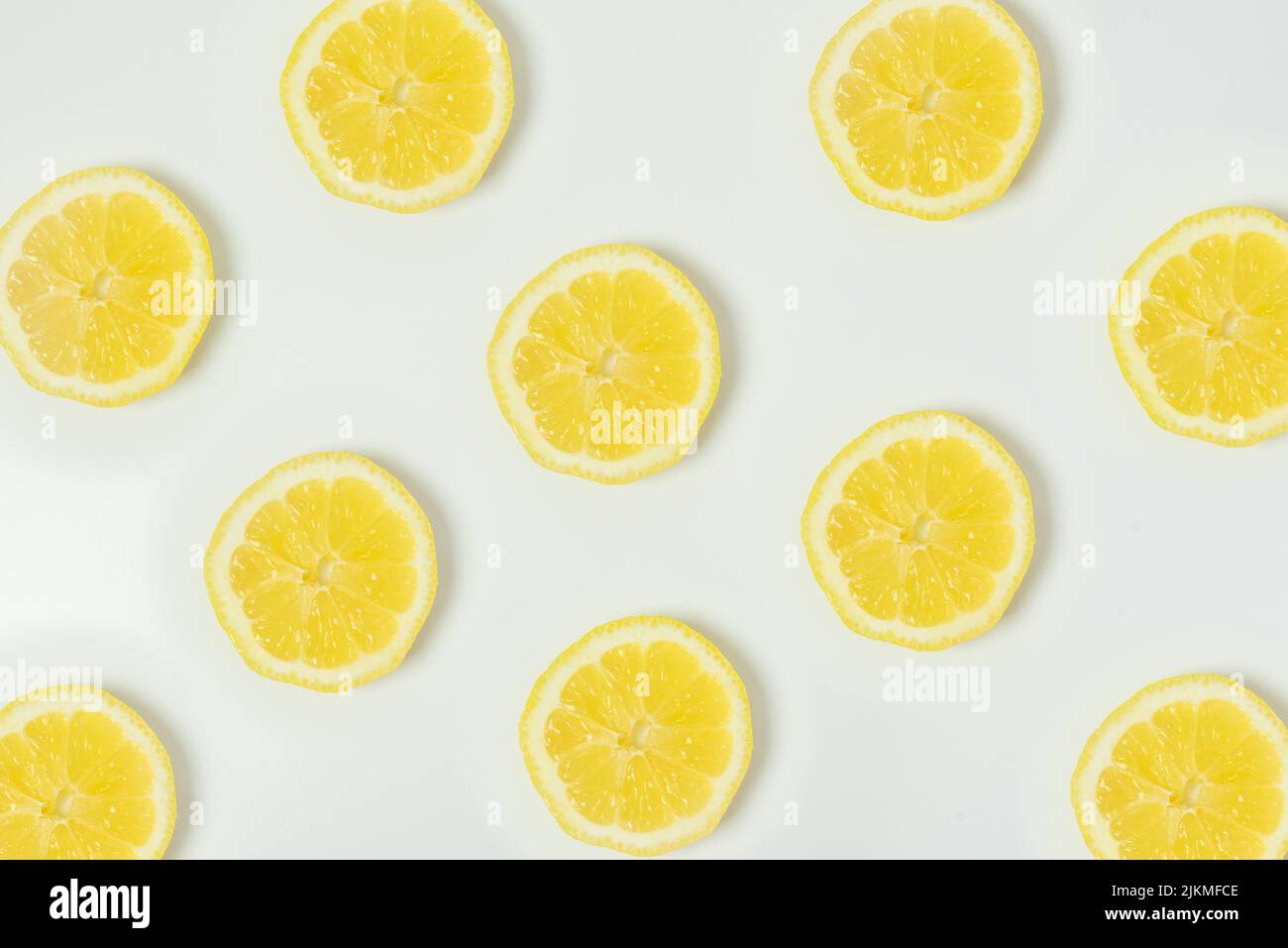 Refresh round lemon slices on white background Stock Photo - Alamy