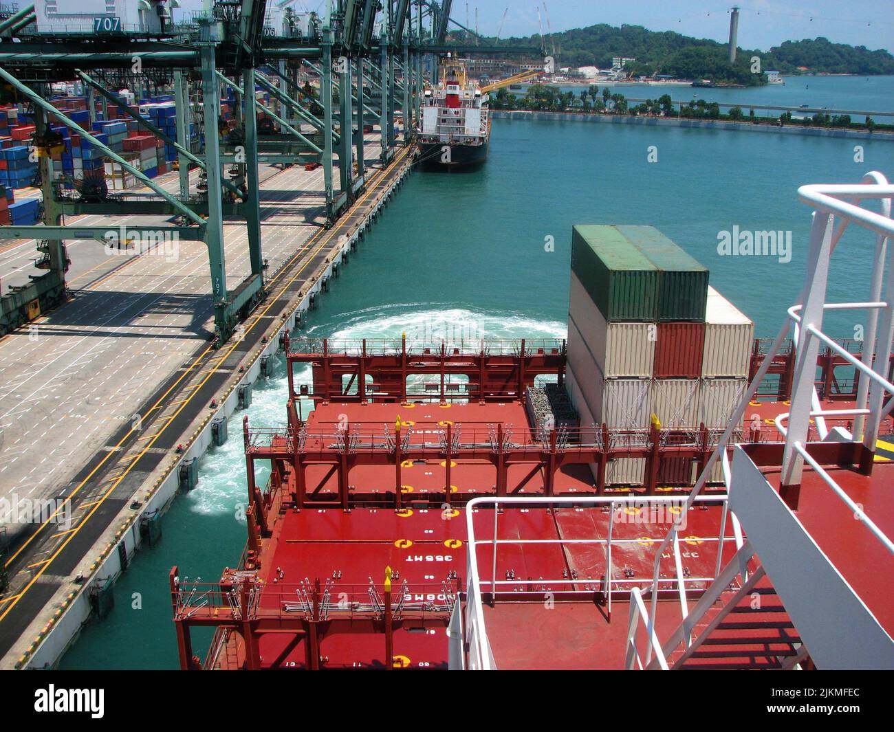 Container ship in port at container terminal. Ships of container ships ...