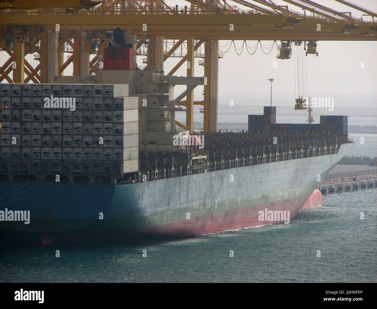 Container ship in port at container terminal. Ships of container ships ...