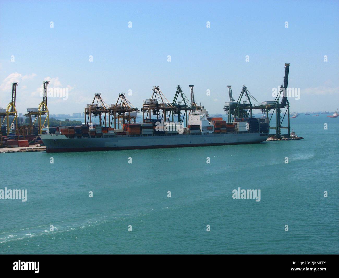 Container ship in port at container terminal. Ships of container ships ...
