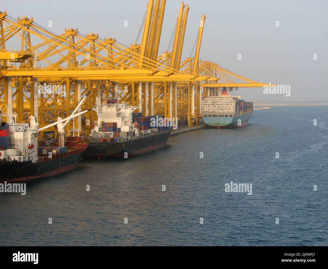 Container ship in port at container terminal. Ships of container ships ...