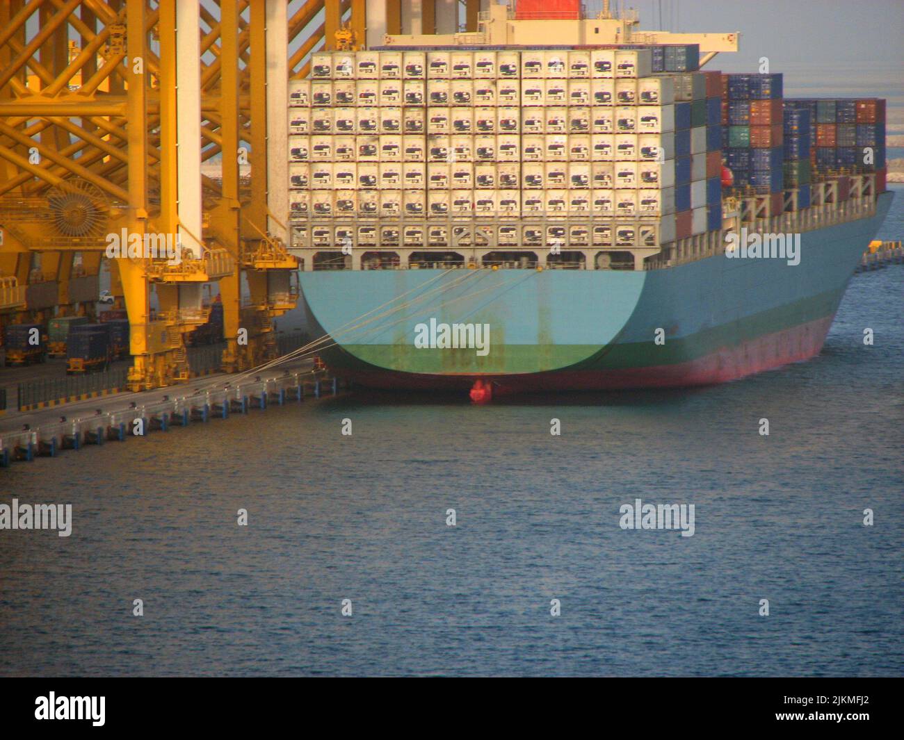 Container ship in port at container terminal. Ships of container ships ...