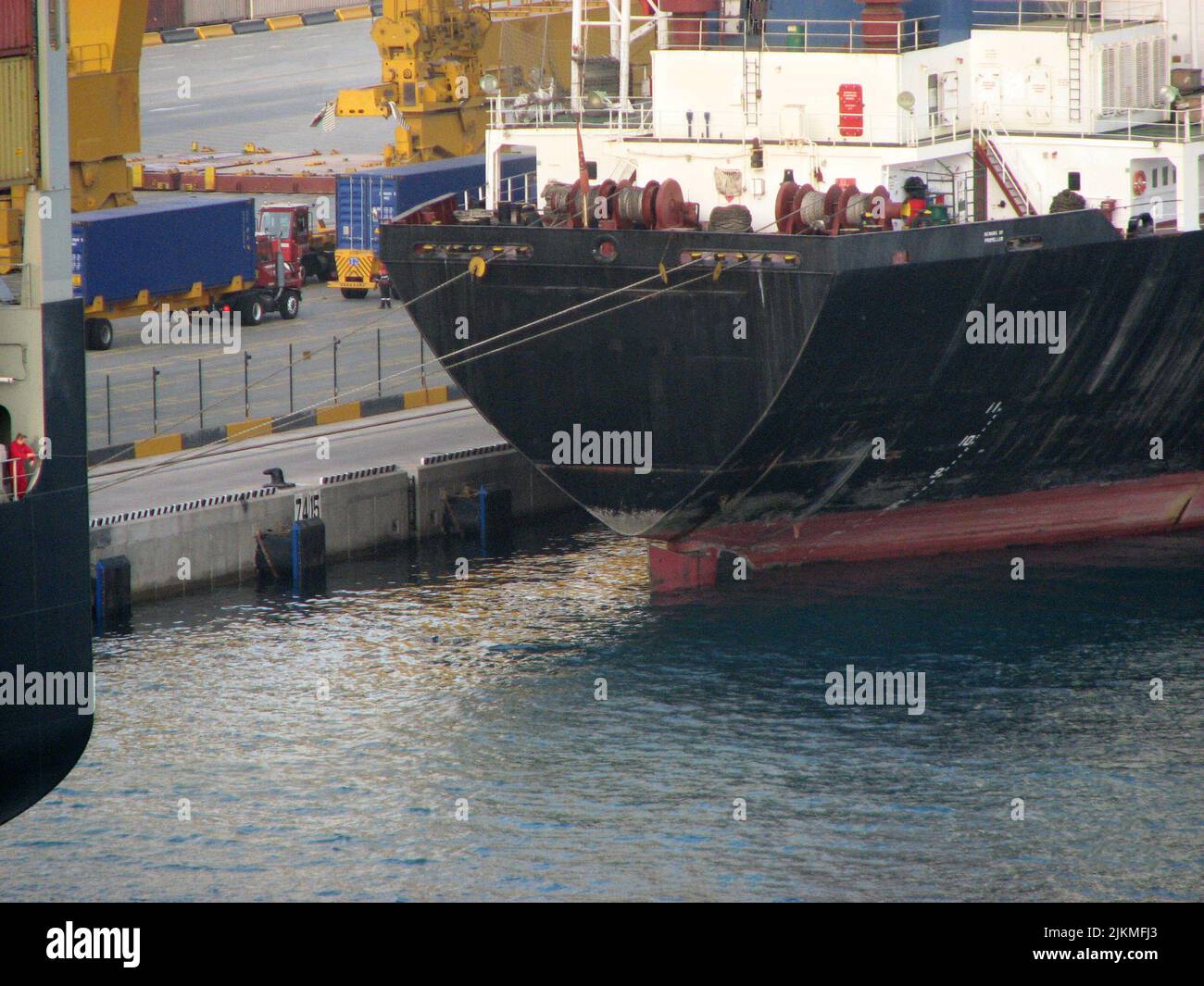 Container ship in port at container terminal. Ships of container ships ...