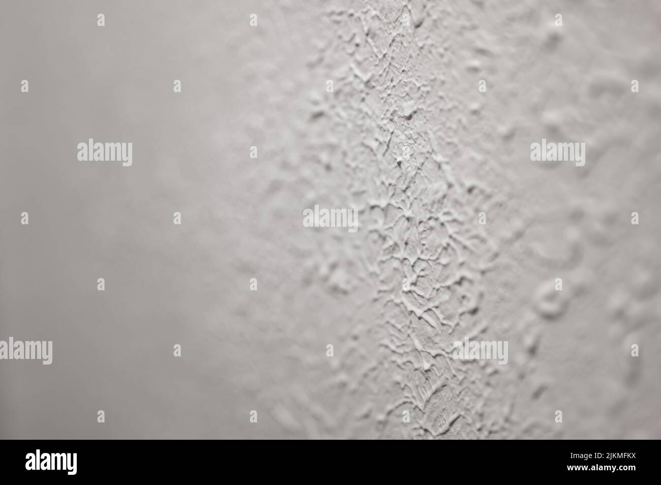 Stomp brush style drywall texture from the 1980s Stock Photo - Alamy