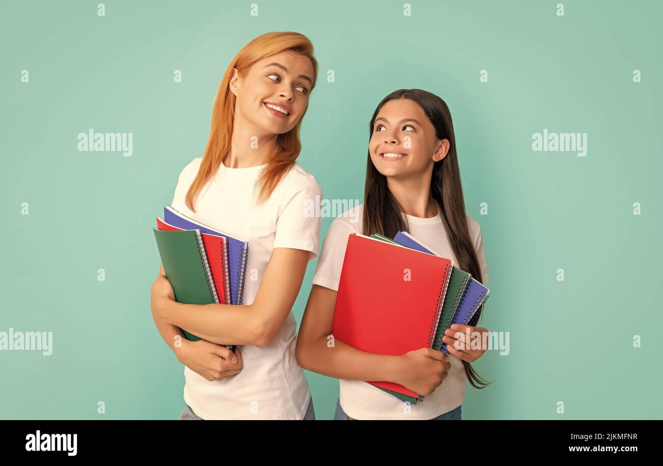 cheerful school pupil and student holding notebooks, back to school ...