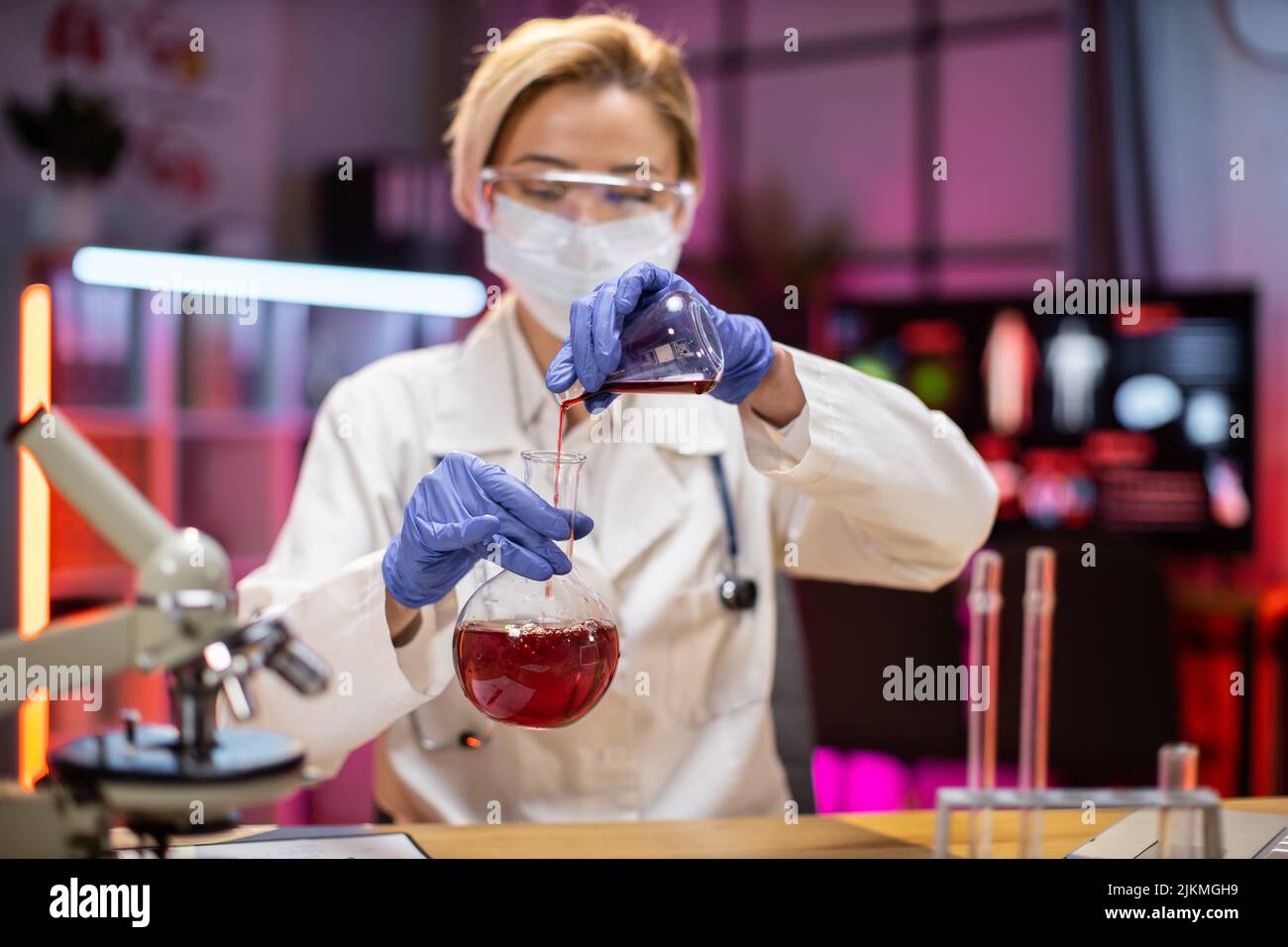 Female scientists or doctor are testing drugs to prevent and destroy ...