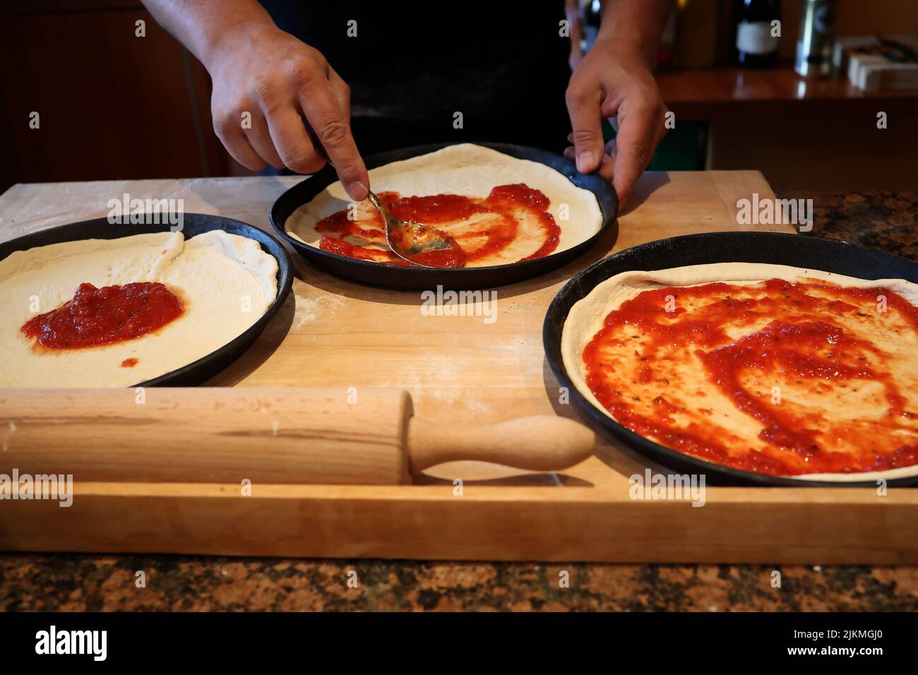 Bake original Italian pizza at home - Traditional preparation Stock ...