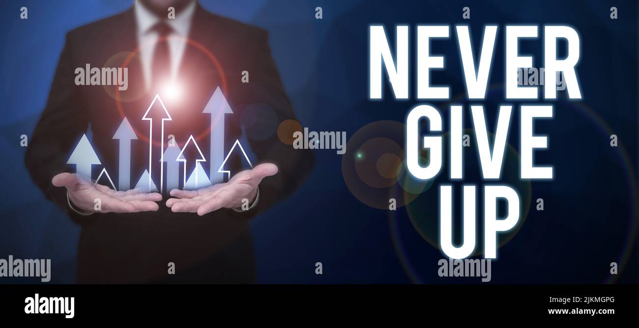 Hand writing sign Never Give Up. Business concept Keep trying until you ...