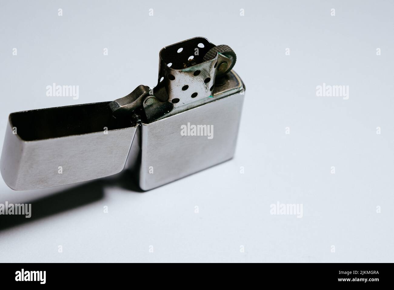 A steel lighter isolated on a white background Stock Photo - Alamy