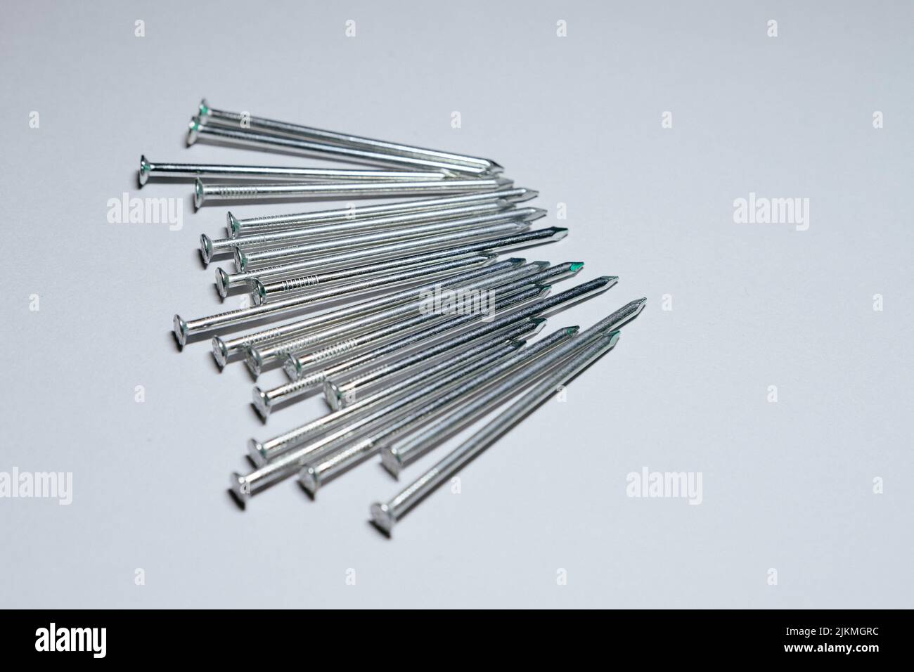 The heap of construction nails isolated on a white background Stock ...