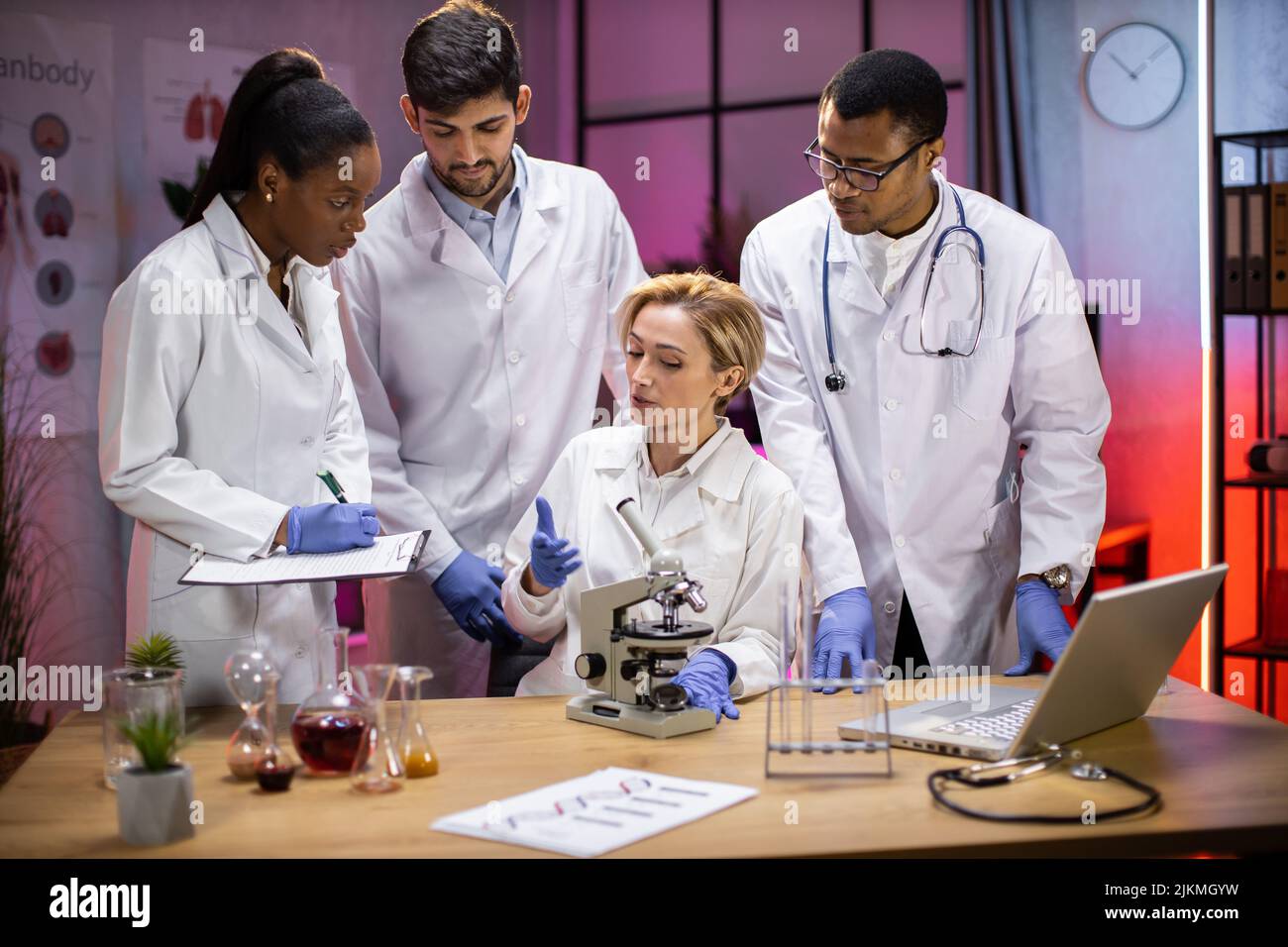 Team of medical research scientists work on a new generation disease ...