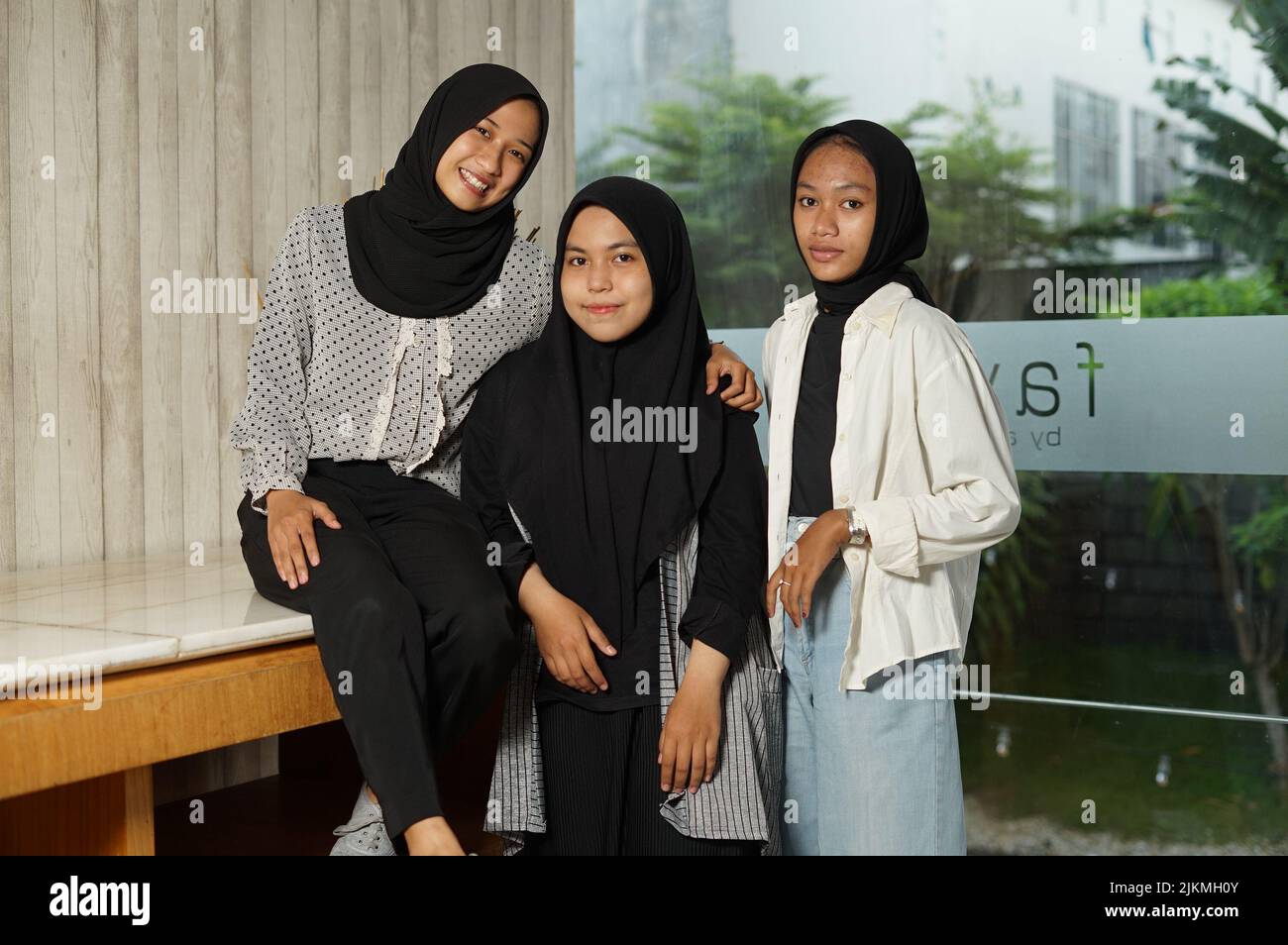 the muslim women look at the camera and they are pose at camera Stock ...