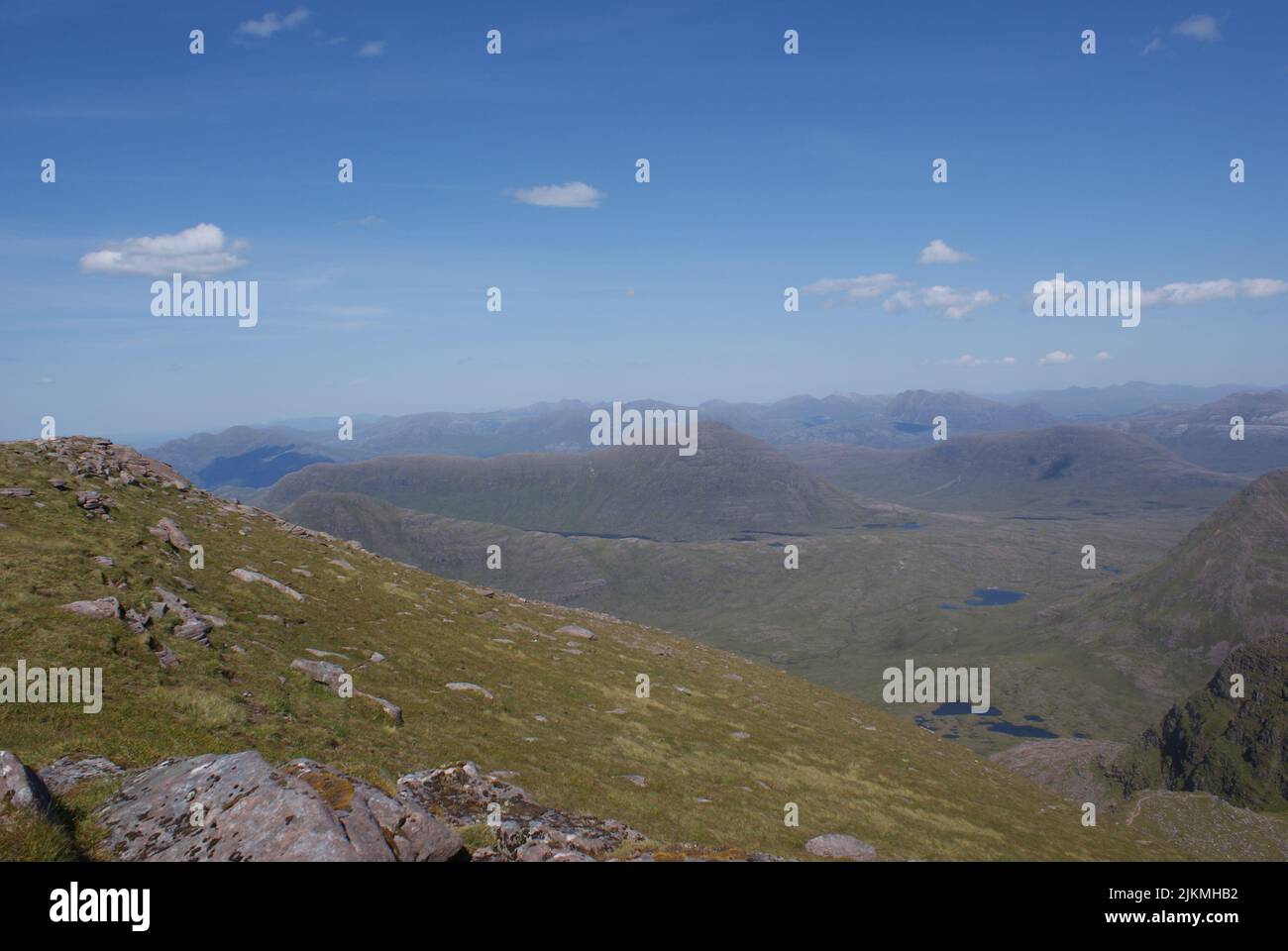 A beautiful sunny day in the Scottish countryside with vast green ...