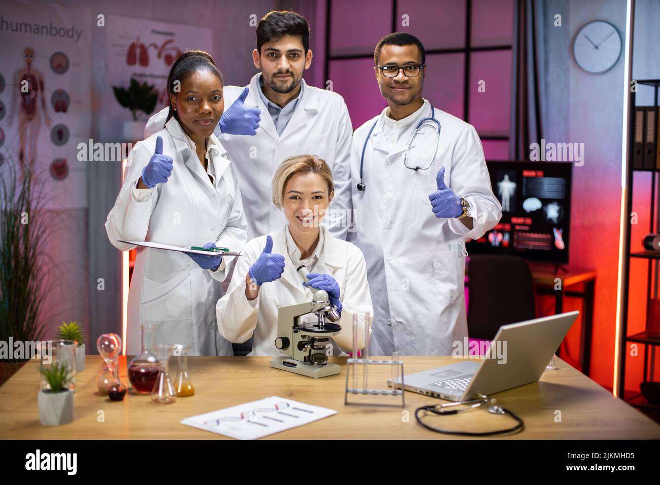 Scientist showing results camera hi-res stock photography and images ...