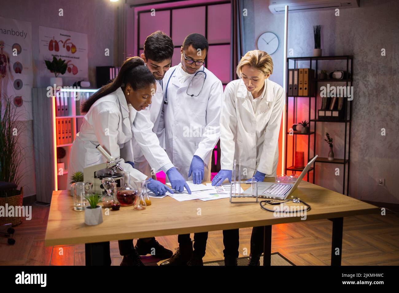 Modern electronics development facility. Diverse team of multiethnic ...