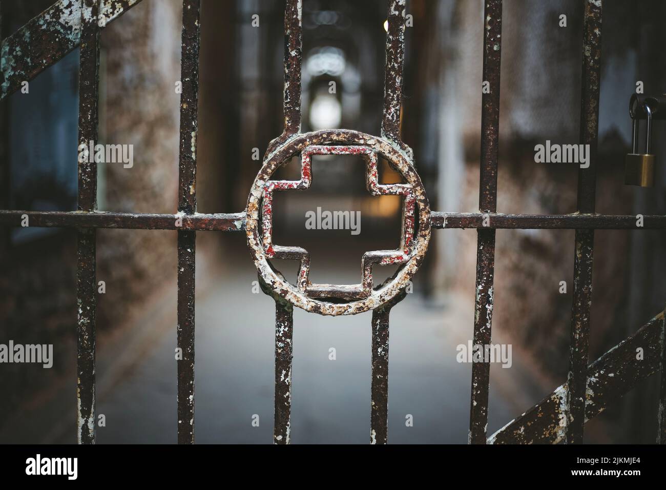 Cross metal iron gate hi-res stock photography and images - Alamy