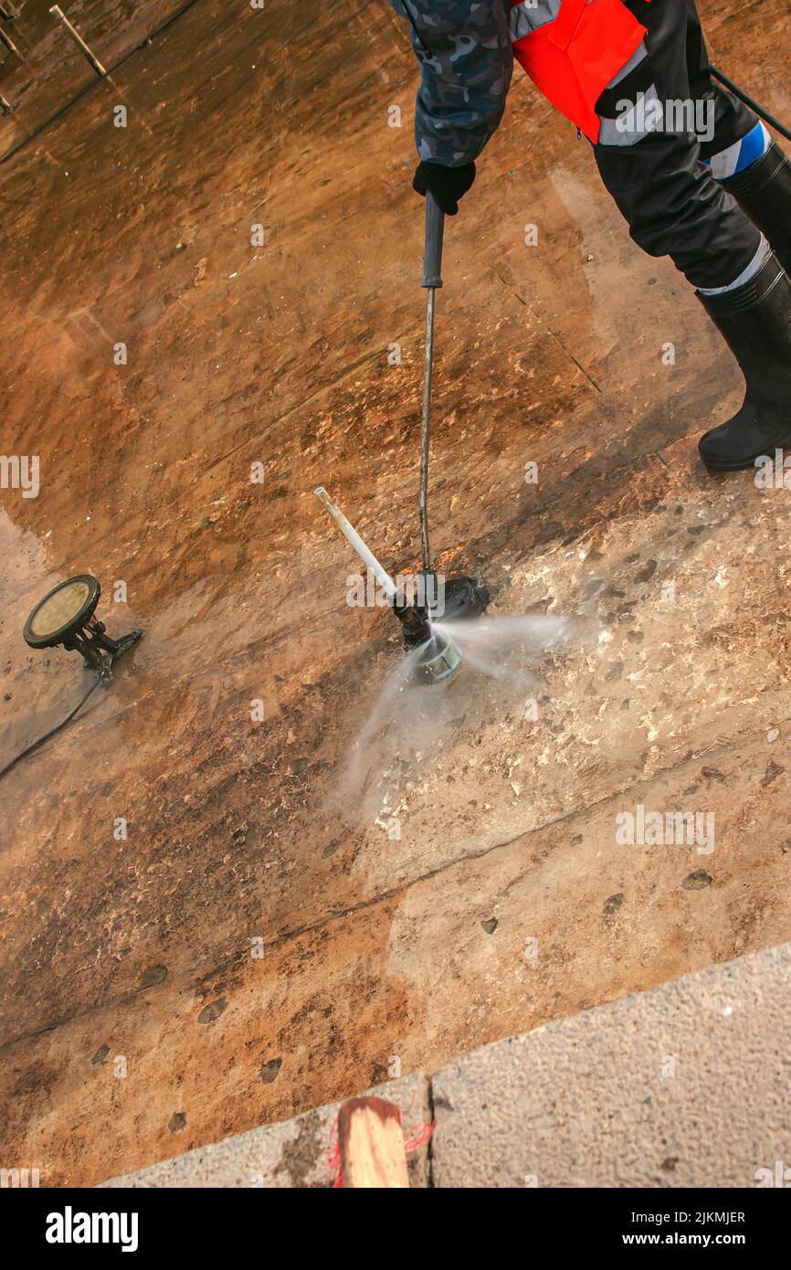 During autumn municipal worker hi-res stock photography and images - Alamy