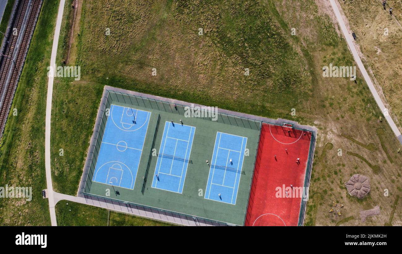 An aerial top view of tennis and basketball courts Stock Photo - Alamy