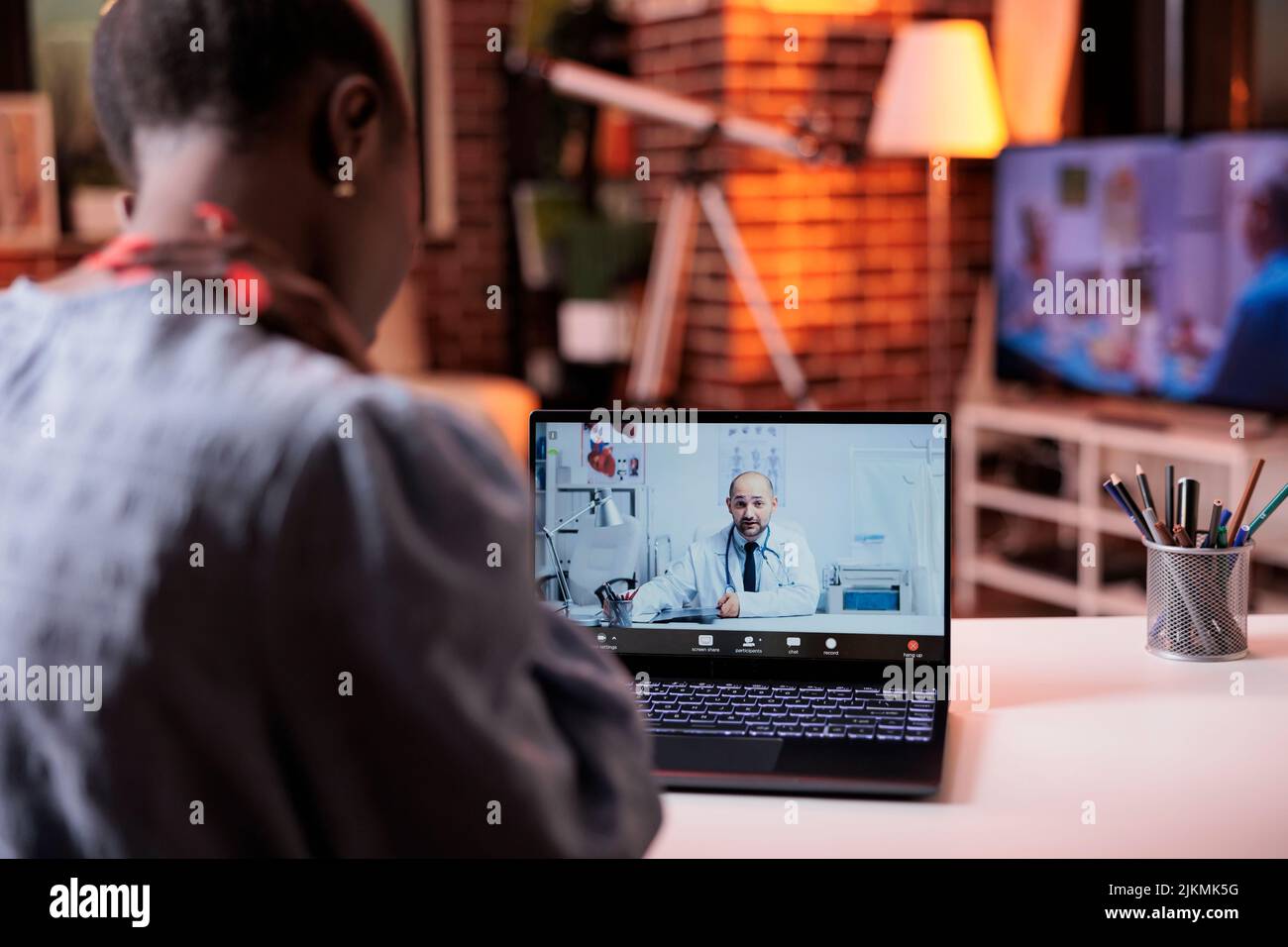 Female patient having online consultation with medical clinic therapist ...