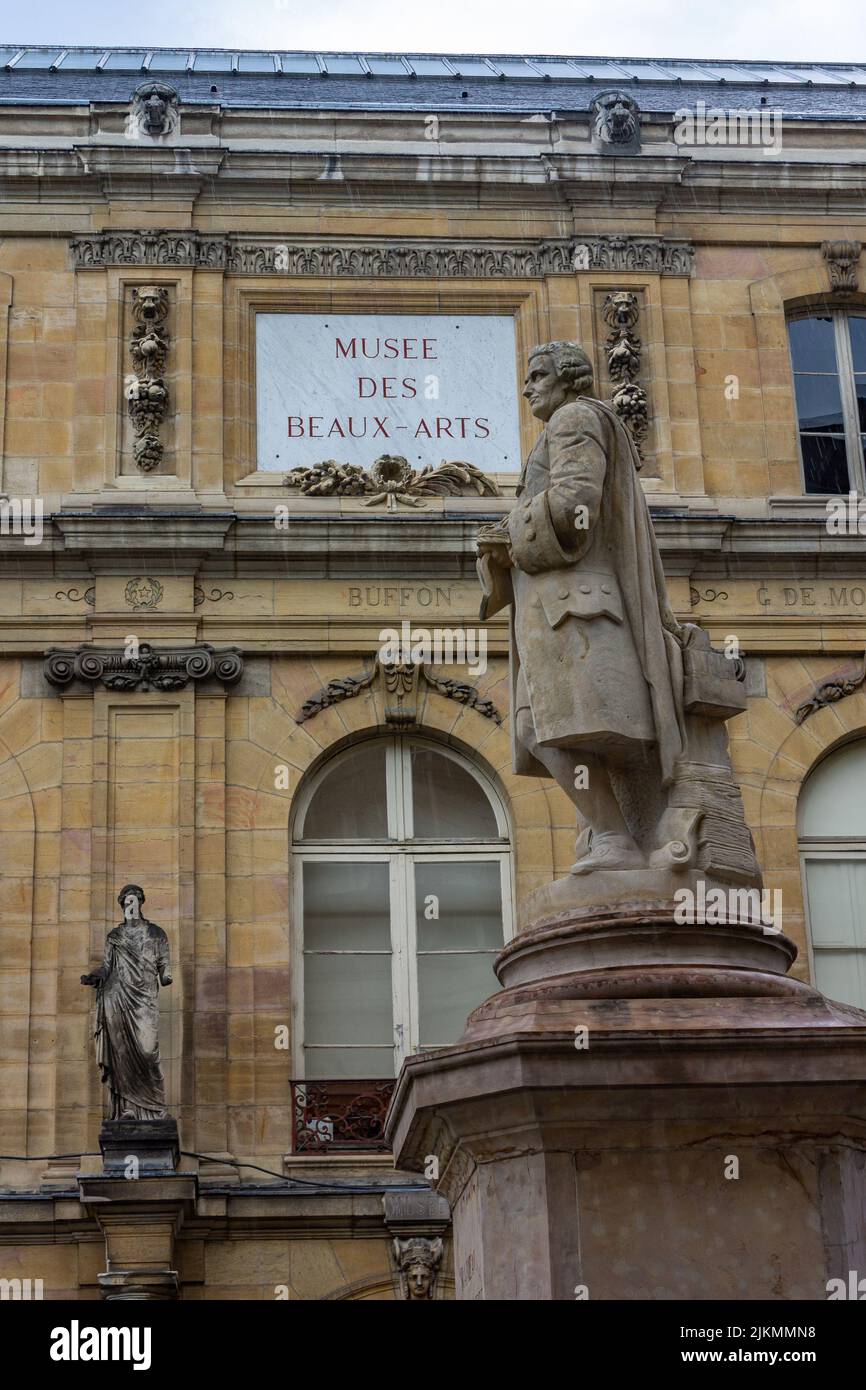A vertical shot of the statue in front of Musee des Beaux arts building ...