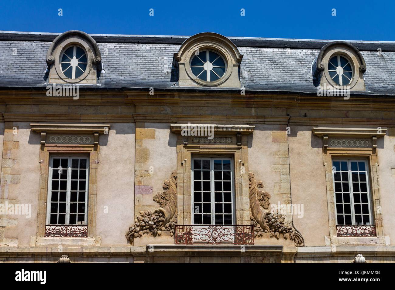 The beautiful architectural details of a historical building in Dijon ...