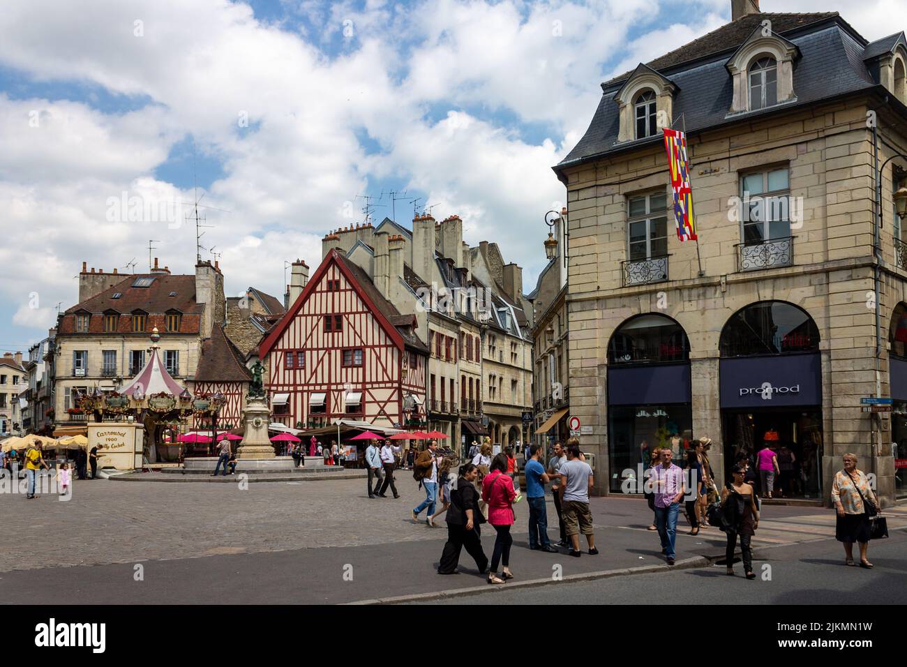 A view of people and historical buildings in Dijon, France, Europe ...