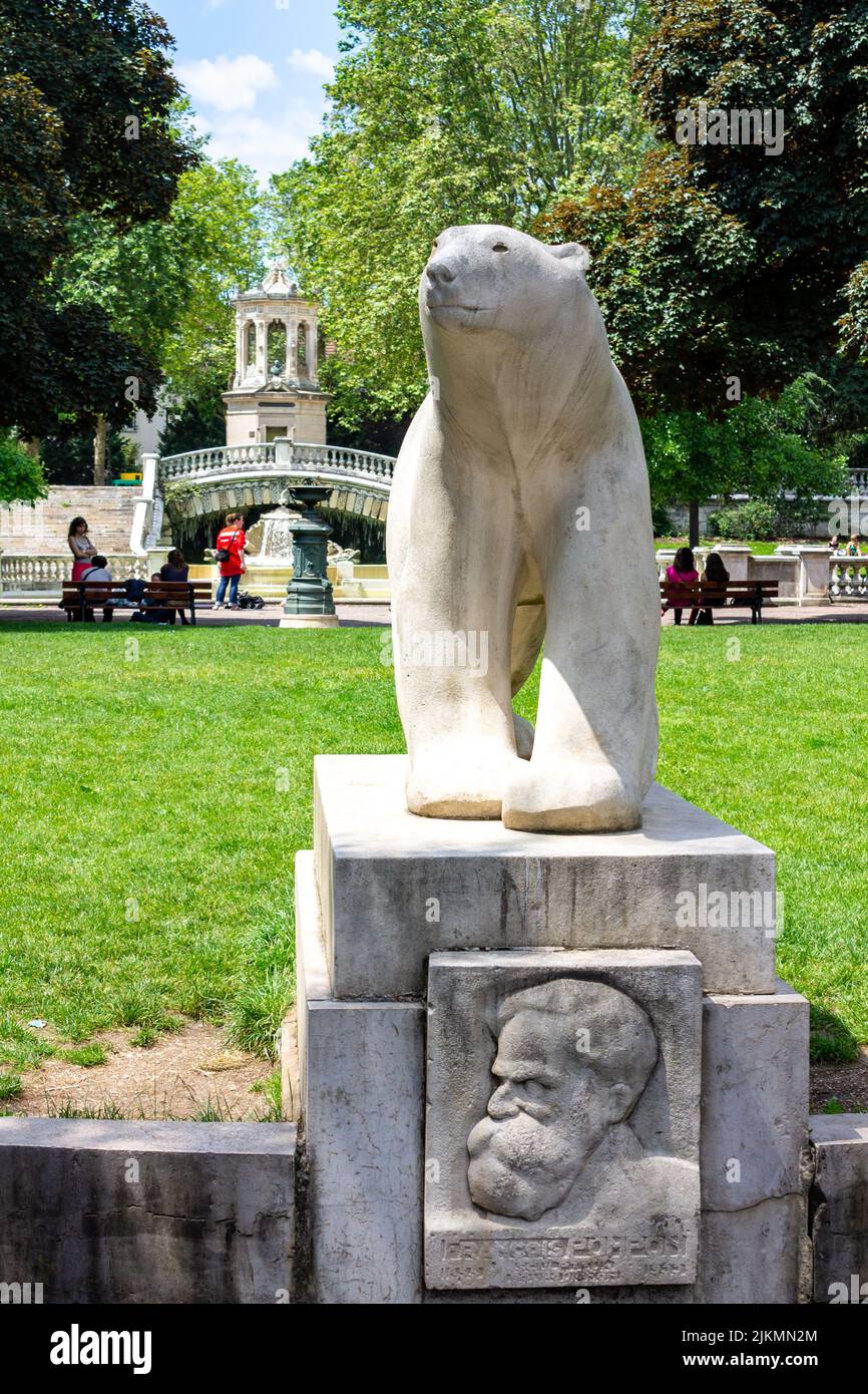 A vertical closeup of the bear statue on Darcy square in downtown Dijon ...