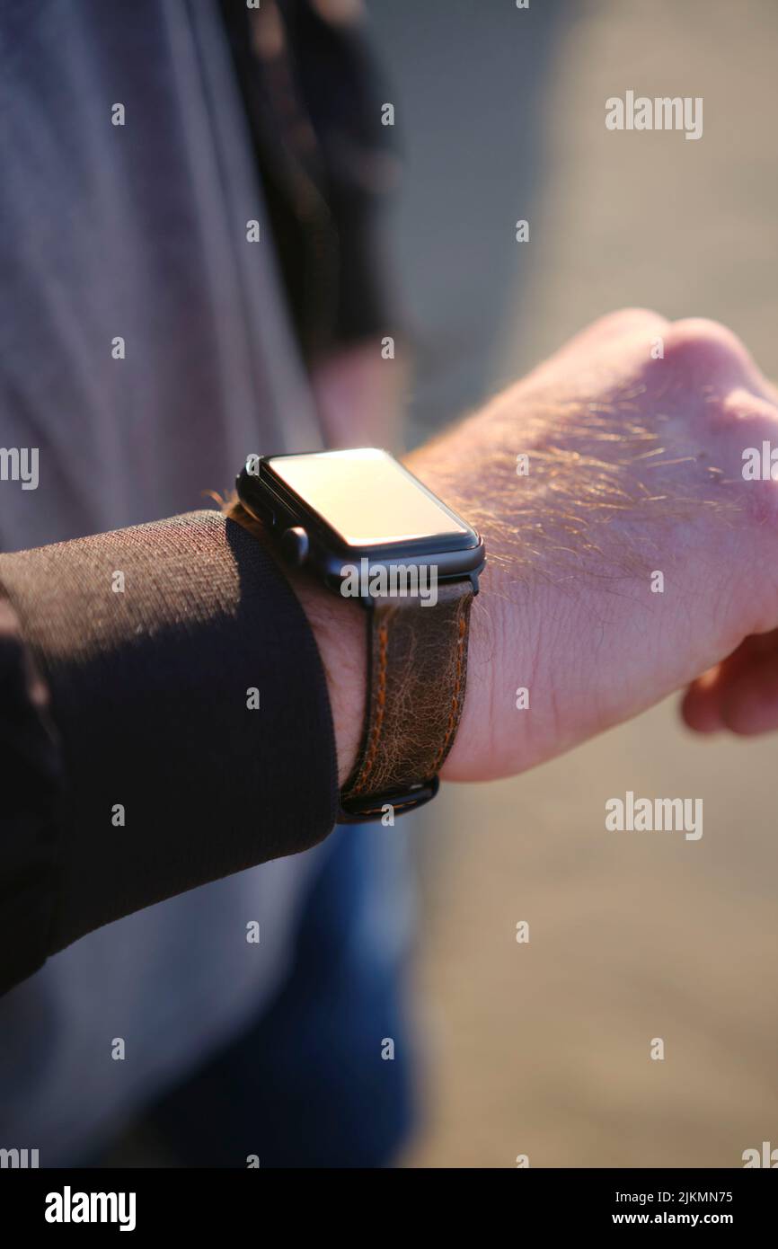 Wearing a smartwatch hi-res stock photography and images - Alamy