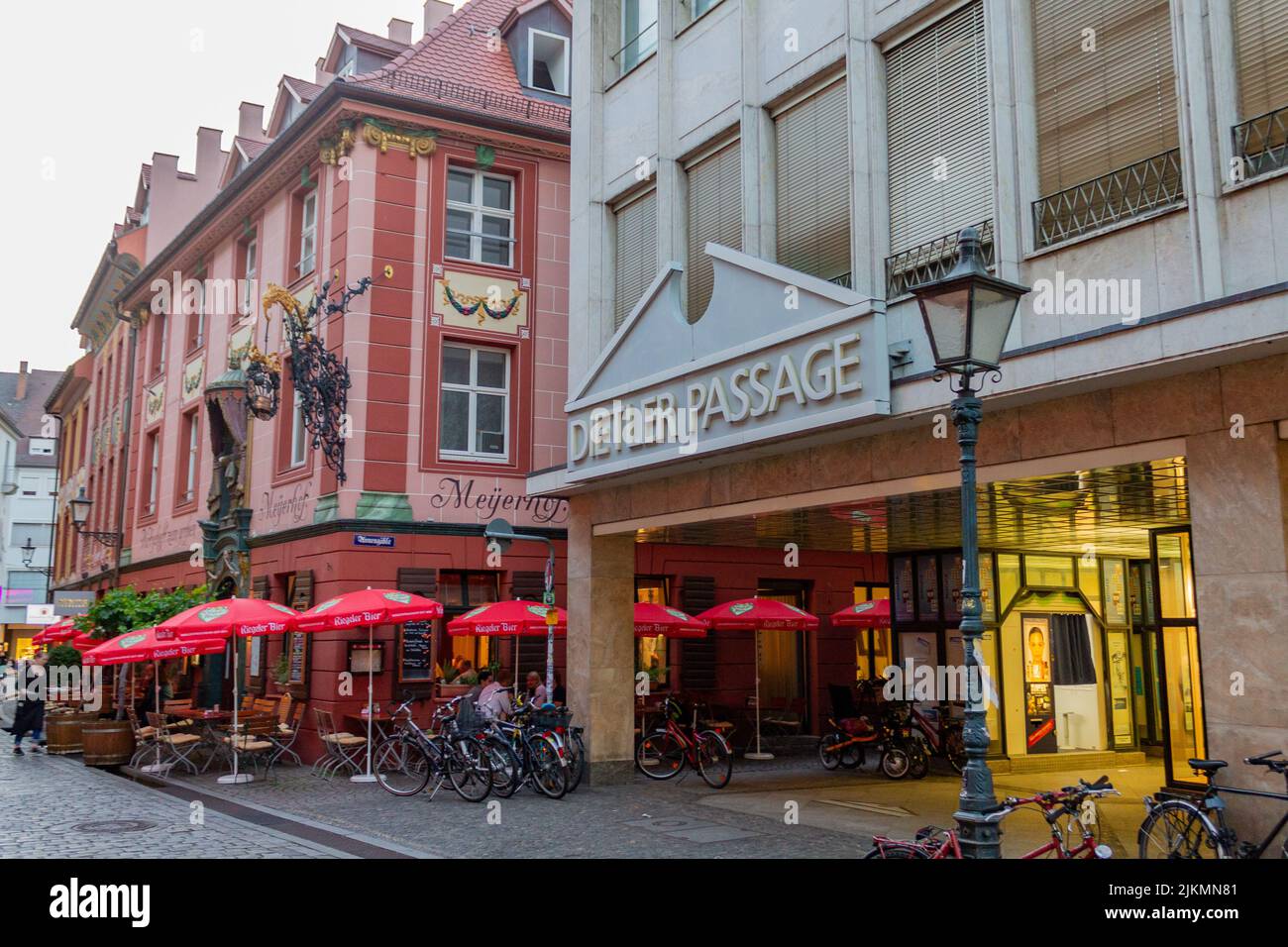 A facade of the historical buildings and cafes in downtown Dijon ...