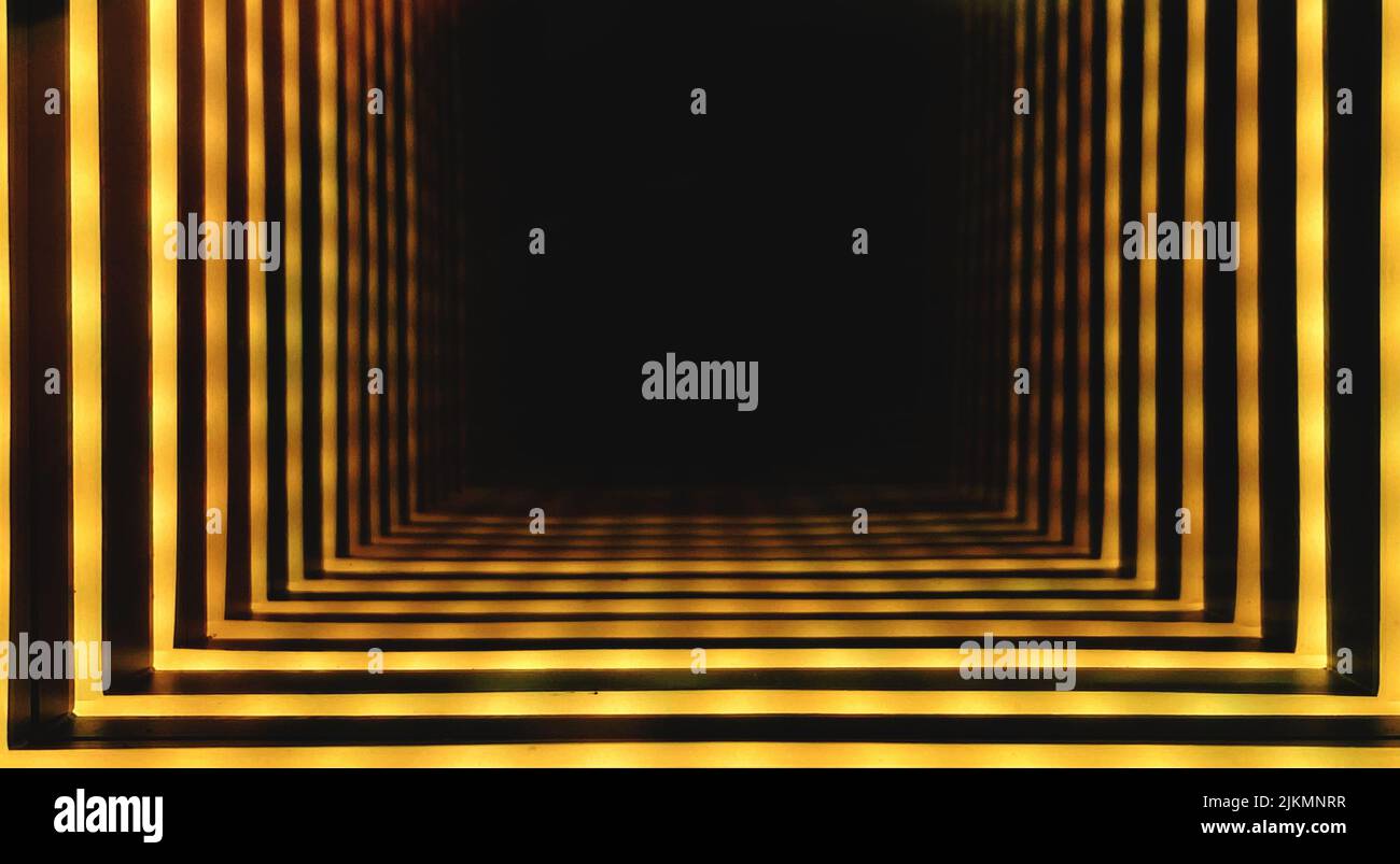 A yellow neon light tunnel background Stock Photo - Alamy