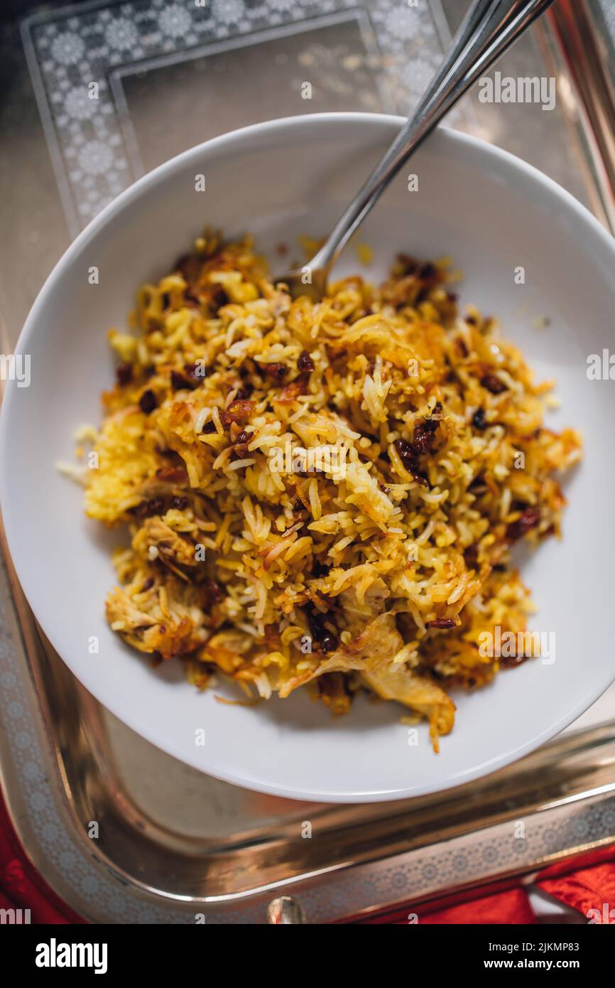 Zereshk Polo ba morgh, serving of Persian Saffron basmati rice dish ...