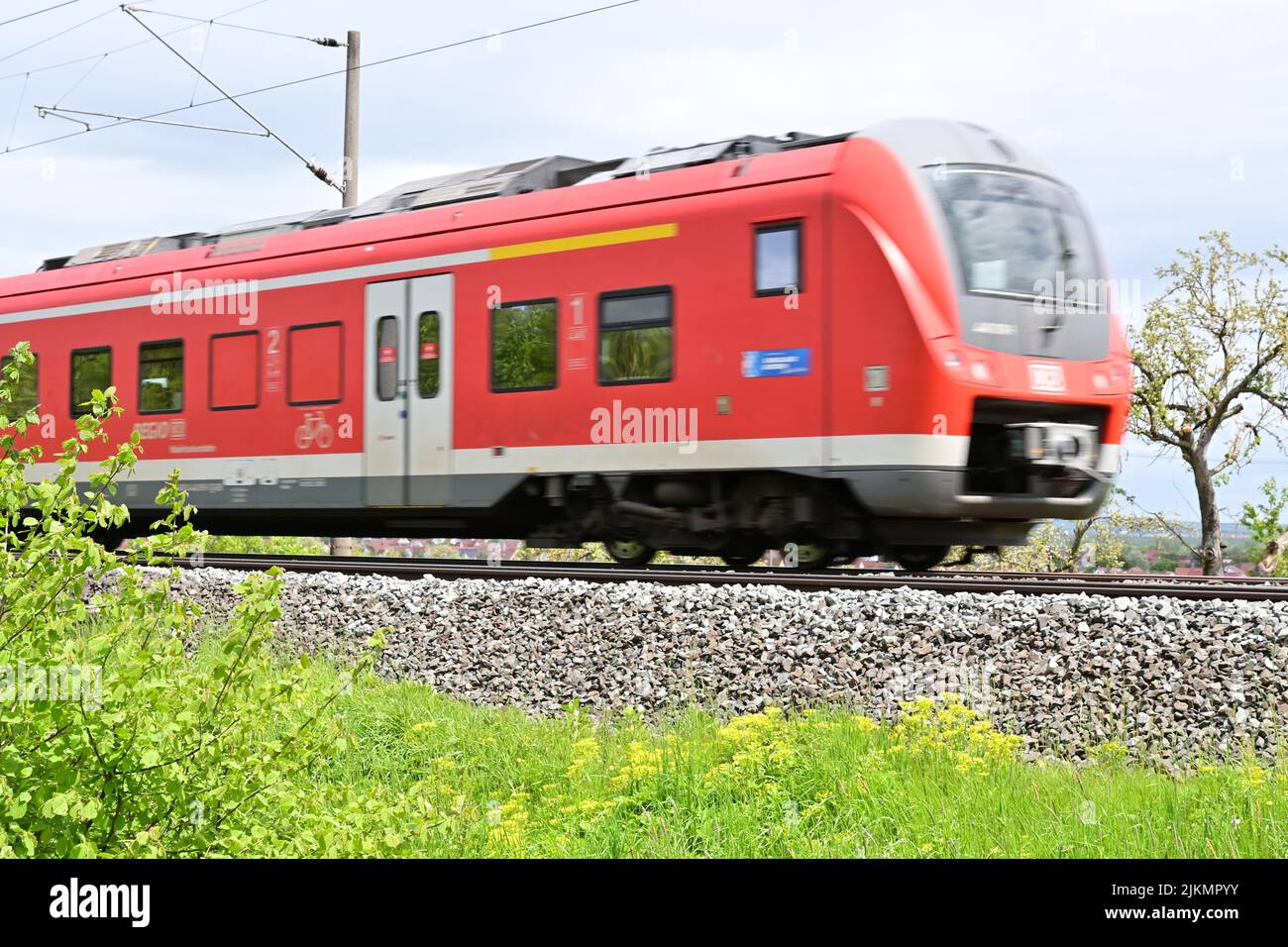 Red train moving in hi-res stock photography and images - Alamy