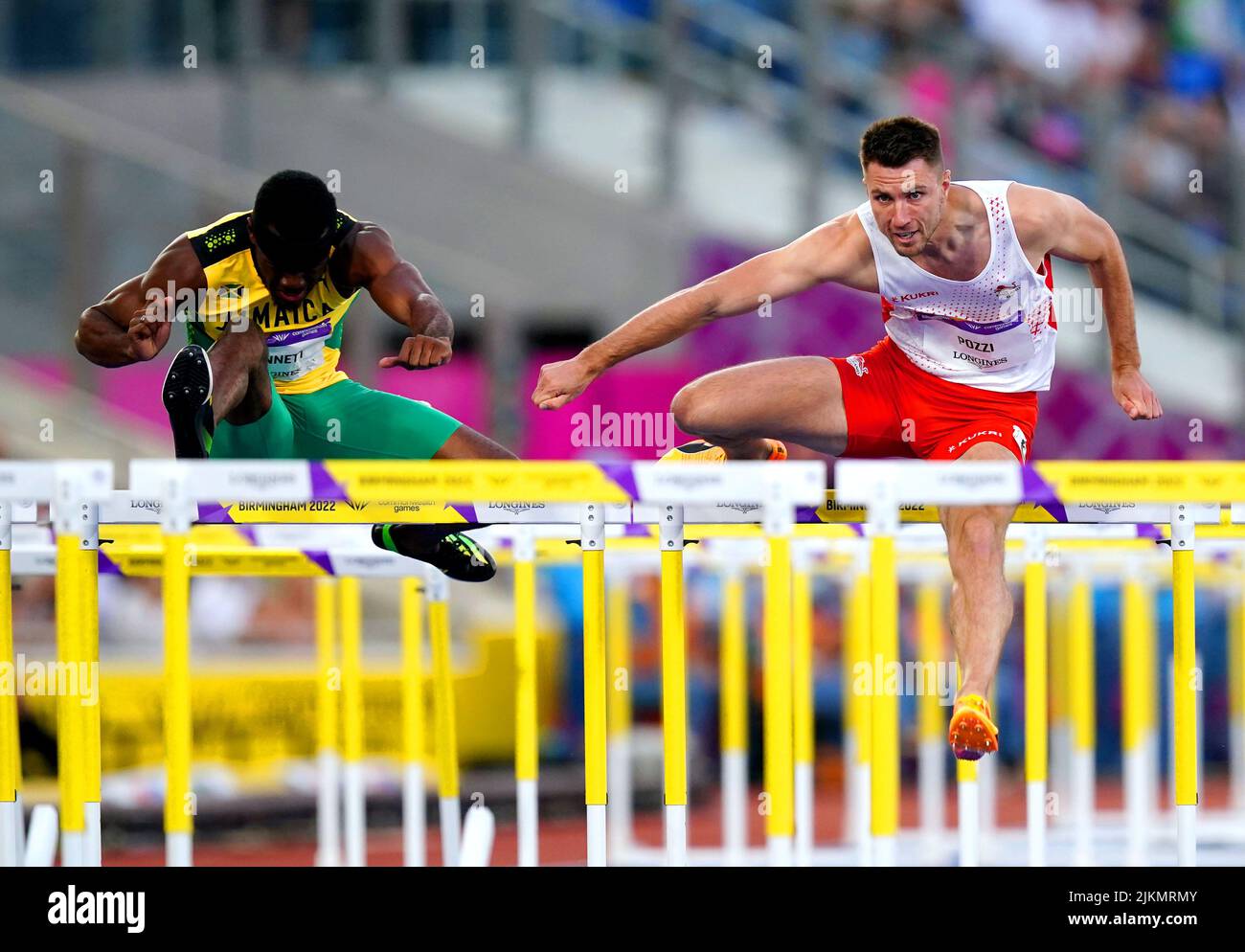 England's Andrew Pozzi (right) in action during Heat 1 of the Men's ...