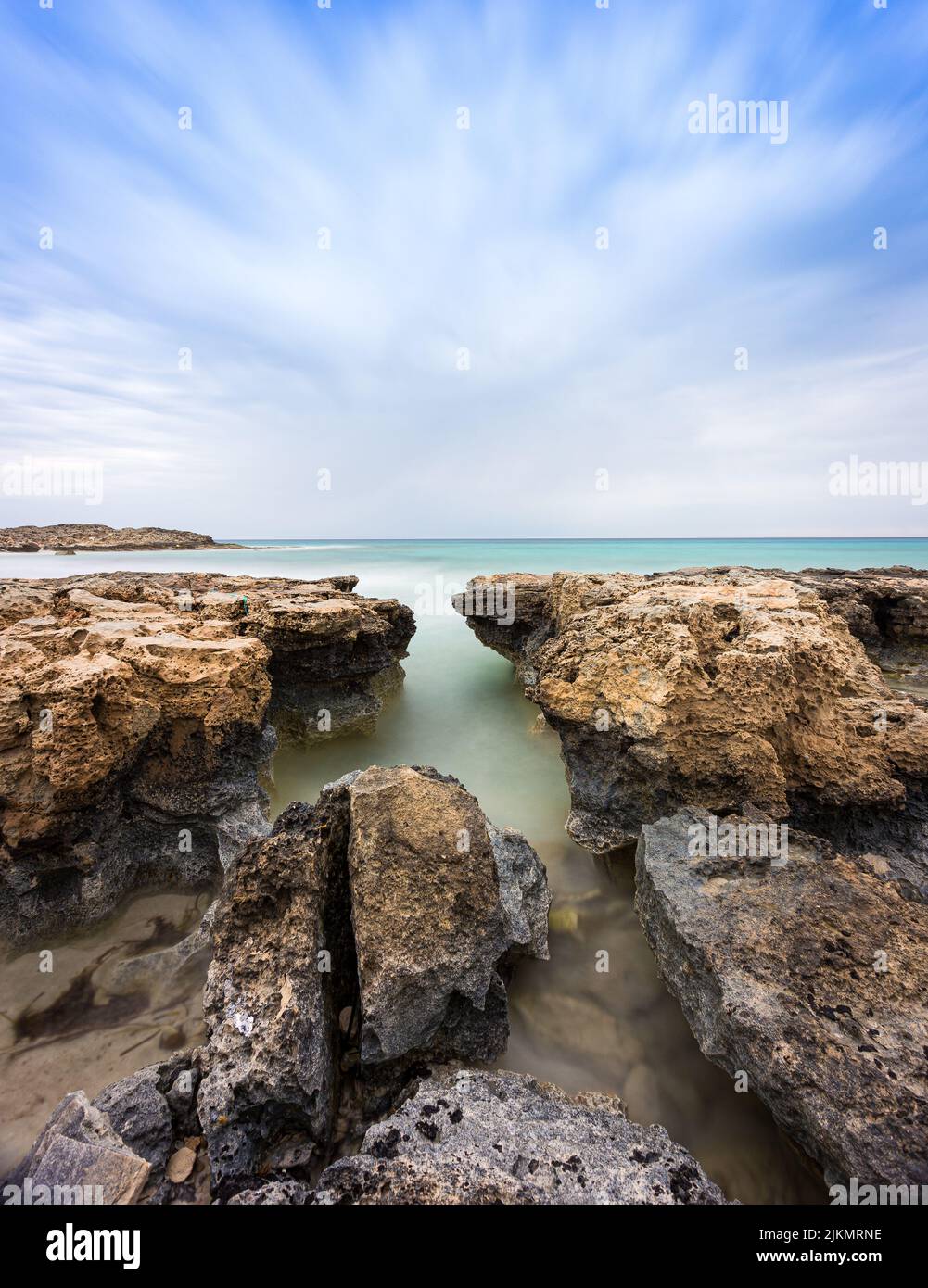 Rocks on beach, Mediterranean volcanic rocks cliff view with by the sea ...