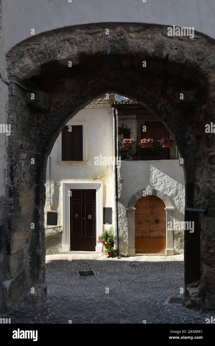 An old arch and the houses of Castrovalva, a medieval village in the ...